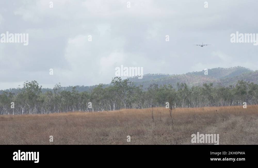 C-130 Hercules flying over Australian bush during exercise Talisman ...
