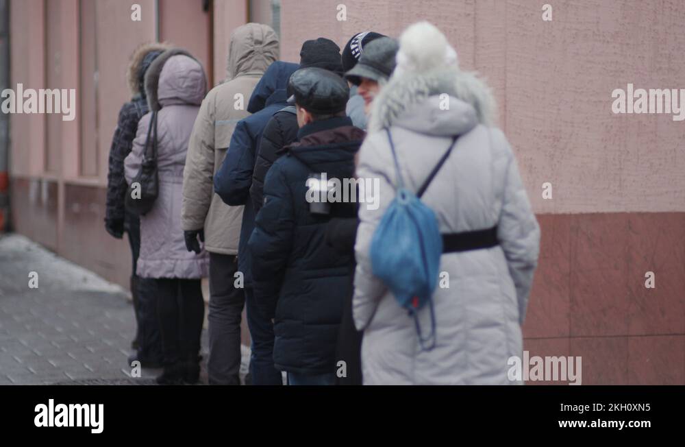 NEW YORK - April 19, 2019: On street queue of people waiting in line to ...