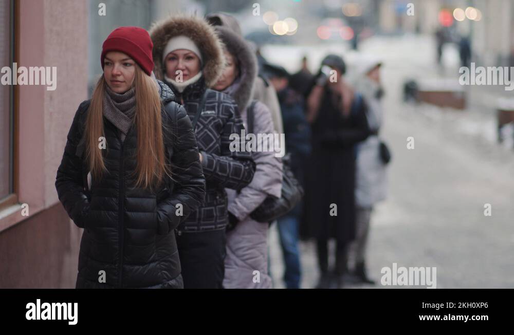 NEW YORK - April 19, 2019: Close up queue of people waiting in line to ...