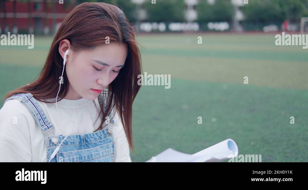 Pretty young asian girl studying Stock Videos & Footage - HD and 4K ...