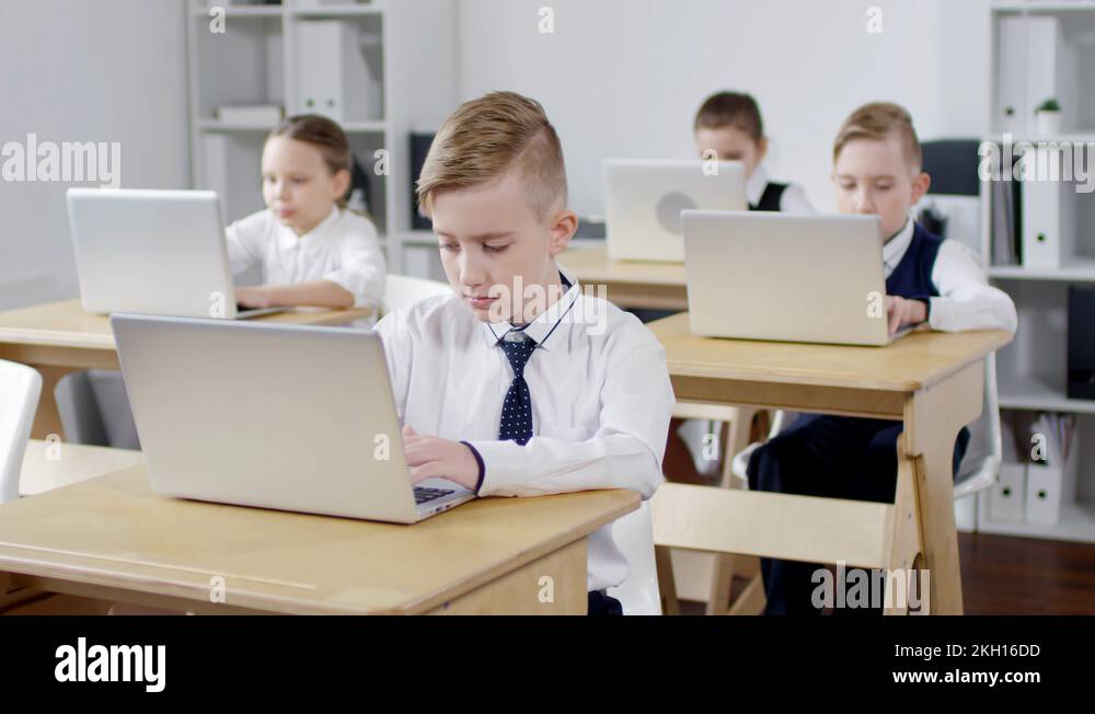 Primary School Pupils Using Laptops in Class Stock Video Footage - Alamy