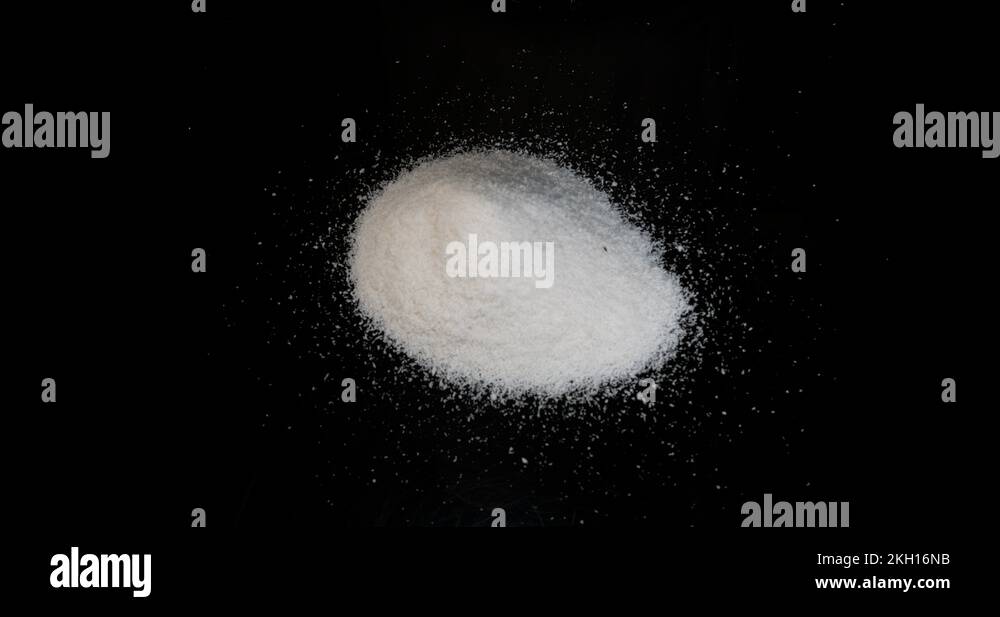 Coconut, cocos nucifera, Fruit and Powder Exploding against Black ...