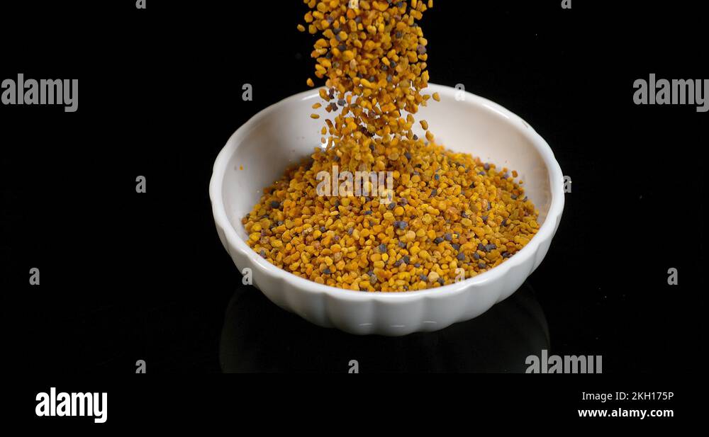 Pollen Dumplings Falling on Black Background, Crockery, Slow Motion 4K ...
