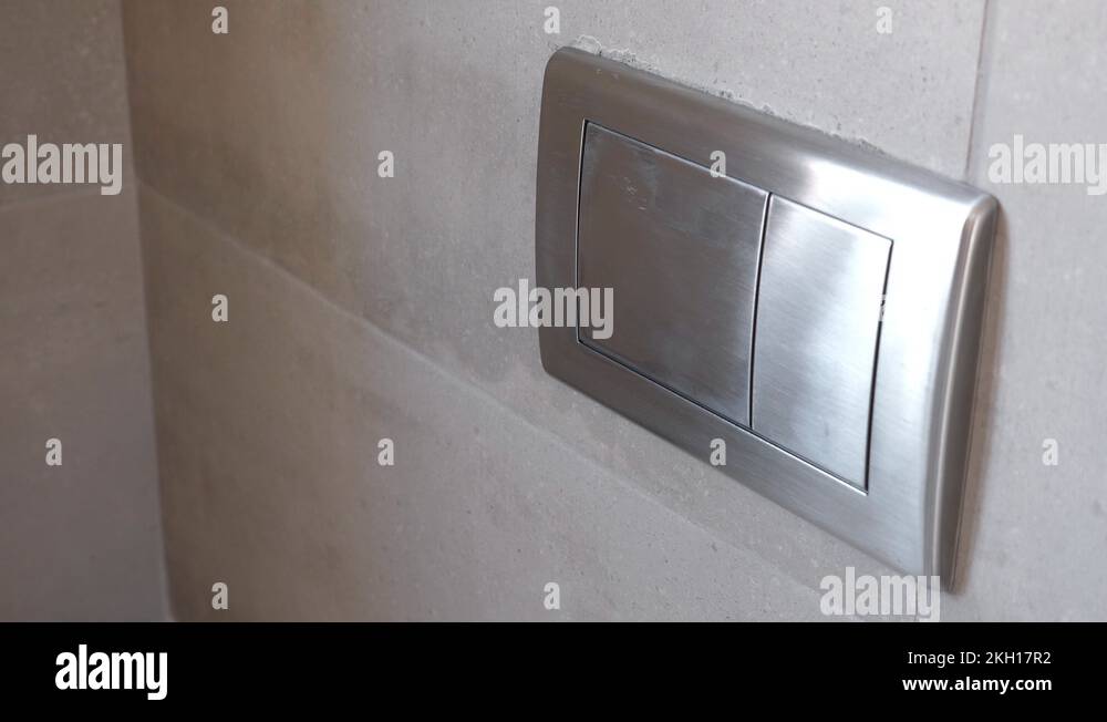 Man push flush button in modern restroom Stock Video Footage - Alamy