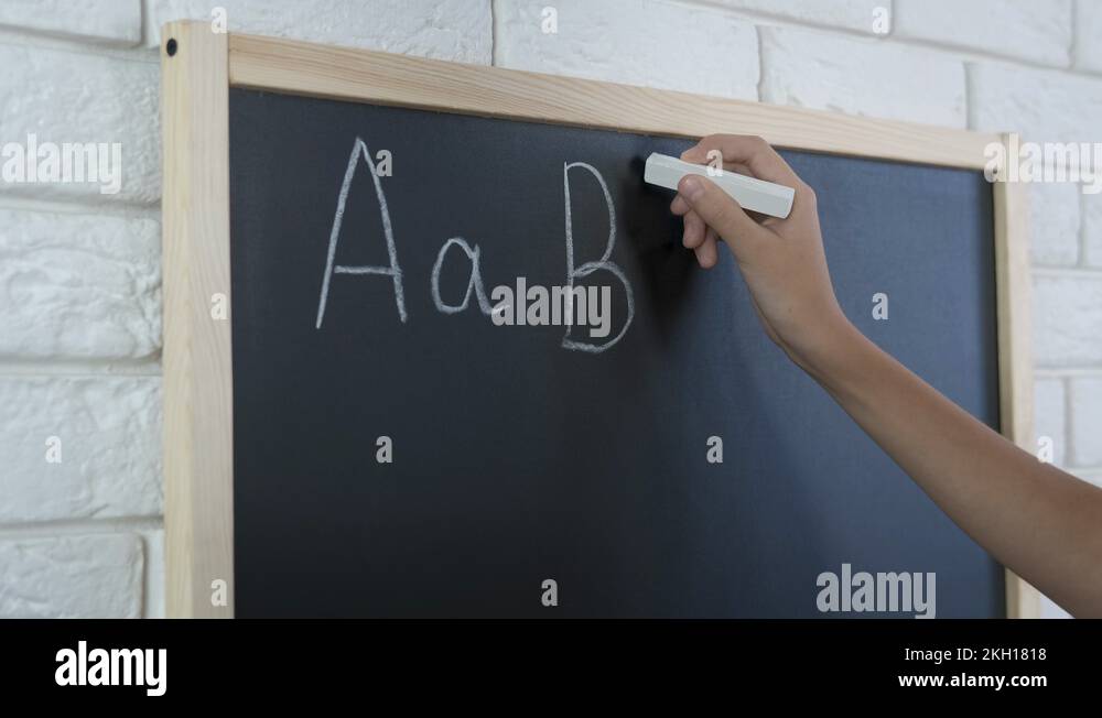 Elementary child writing on chalkboard Stock Videos & Footage - HD and ...