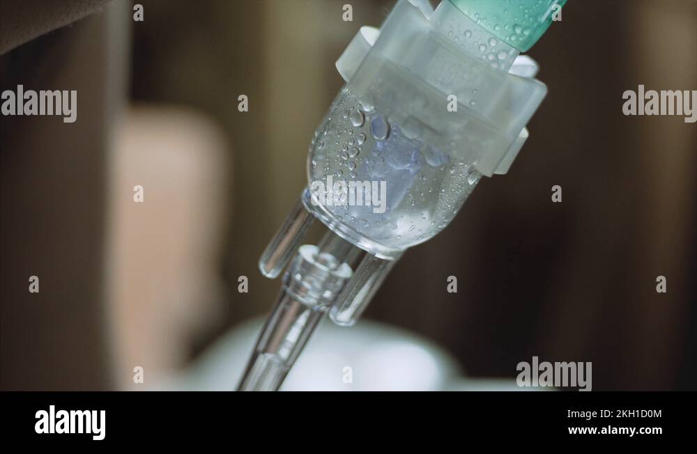 Woman with bronchitis using aerosol nebulizer inhaler Stock Video ...