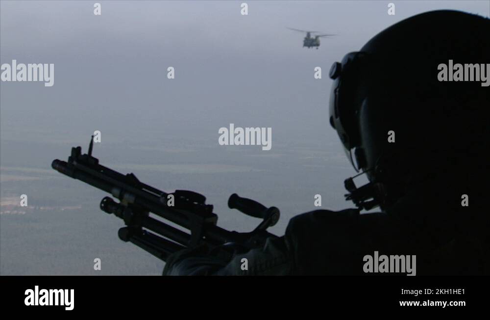air to air on the ramp of a chinook helicopter with shots of the tail ...
