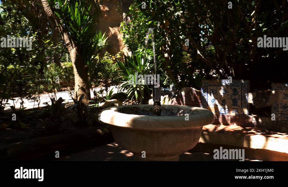 Circle gimbal motion of water drinking fountain stream gushing from ...