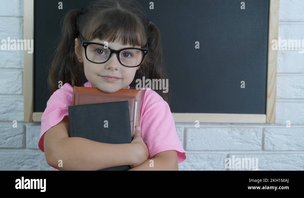 Child hugging book Stock Videos & Footage - HD and 4K Video Clips - Alamy