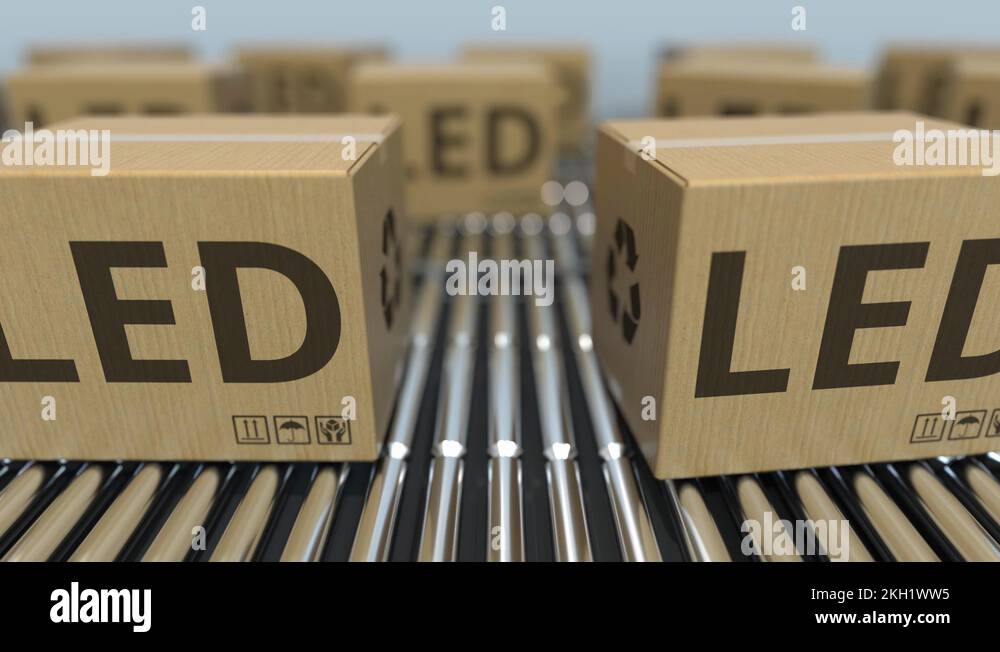 Cartons with LED lighting equipment on roller conveyors. Loopable 3D ...