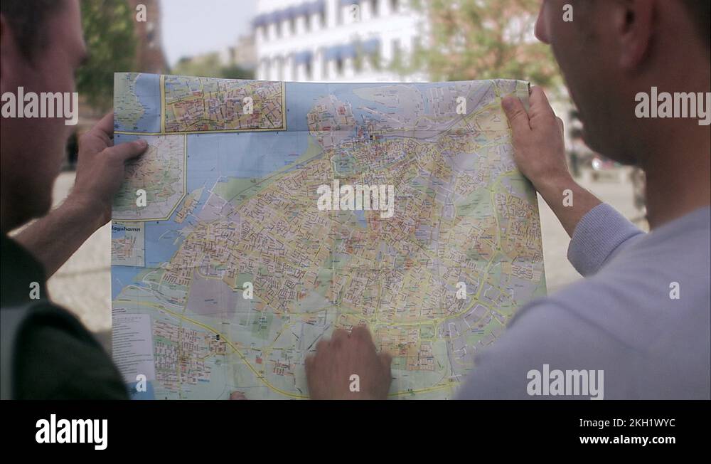 Using a map Stock Videos & Footage - HD and 4K Video Clips - Alamy