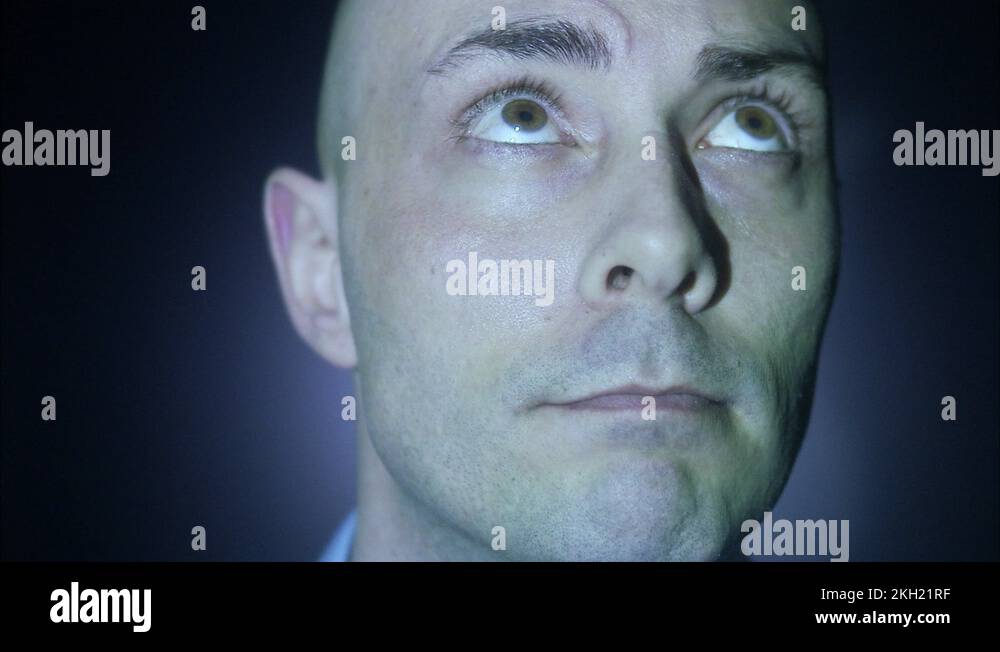 Question mark projected on a man's face Stock Video Footage - Alamy
