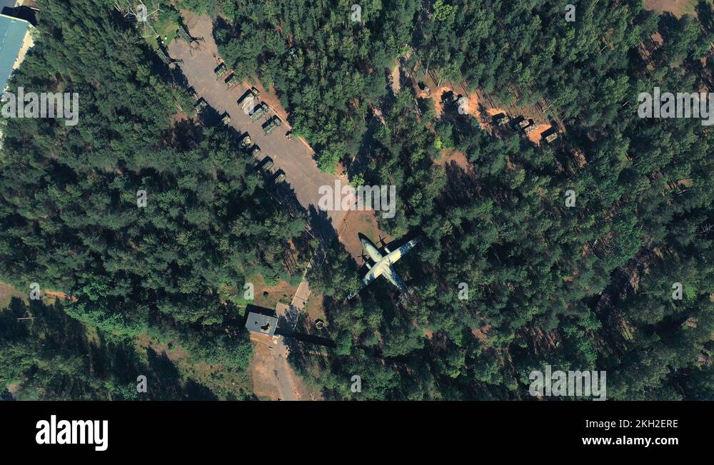 Top view spy drone shooting a russian military base with airplanes ...