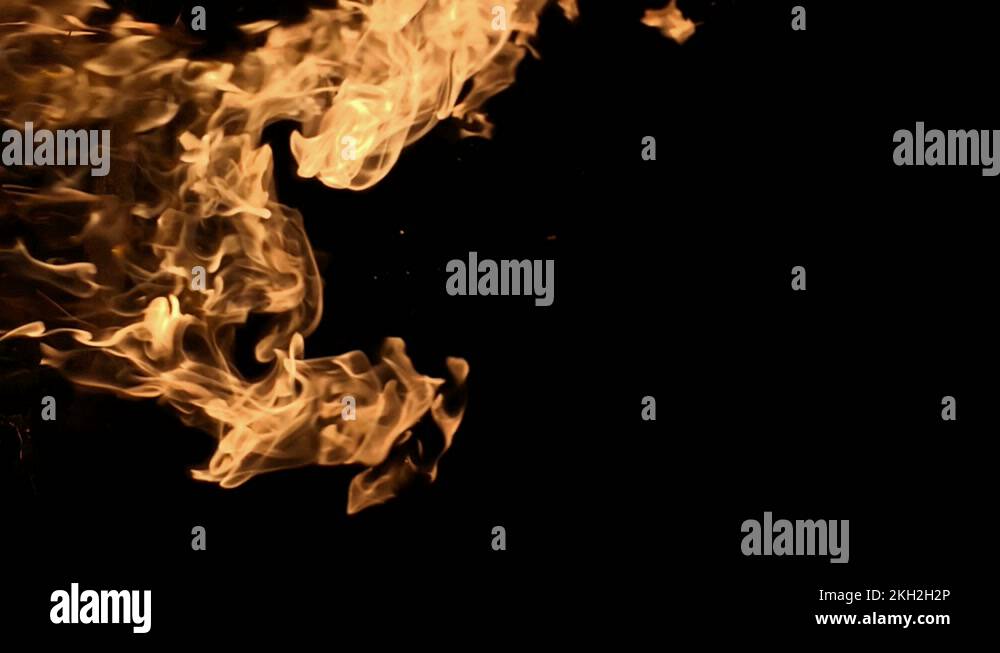 Fire Flames Igniting and blazing up in Slow Motion isolated on black ...