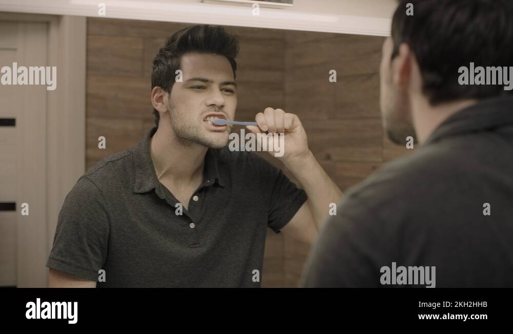 Man cleaning teeth Stock Videos & Footage - HD and 4K Video Clips - Alamy