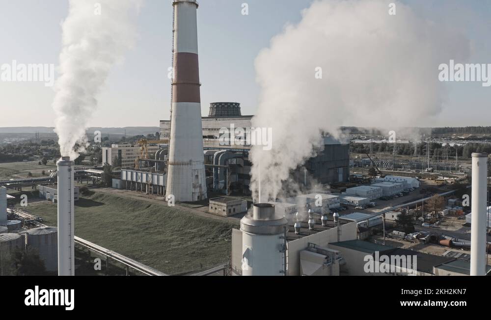 Factory producing smoke. Air pollution, industry impact on environment ...