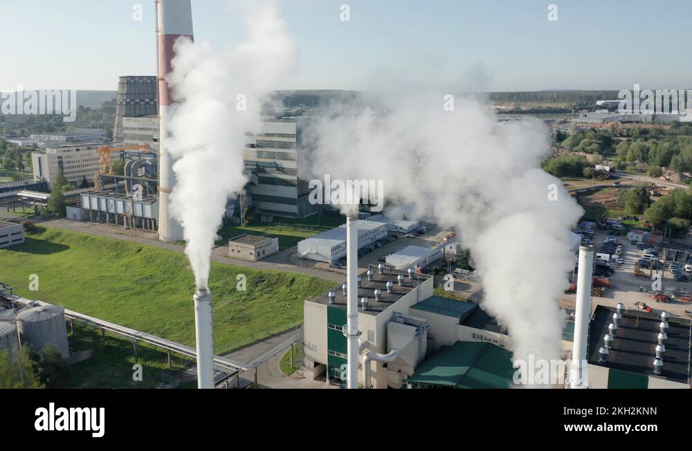 Factory producing smoke. Air pollution, industry impact on environment ...