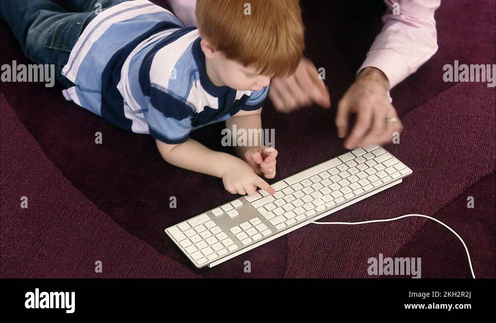 MS Father and son (4-5) using computer Keyboard Stock Video Footage - Alamy