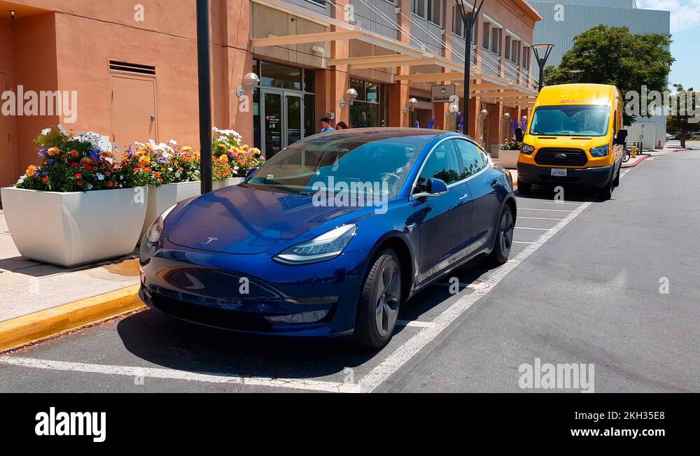 Blue tesla model 3 Stock Videos & Footage - HD and 4K Video Clips - Alamy