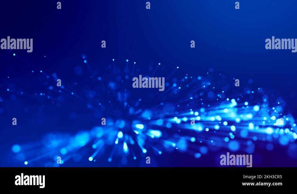 blue shiny sparkling particles with light rays move in a viscous liquid ...