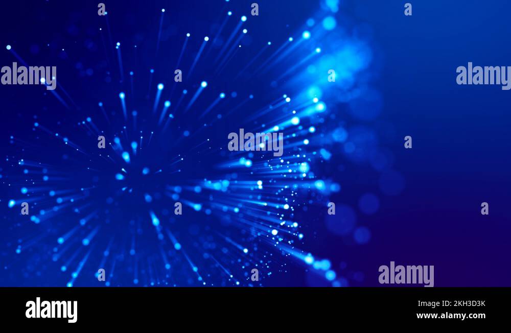 blue shiny sparkling particles with light rays move in a viscous liquid ...