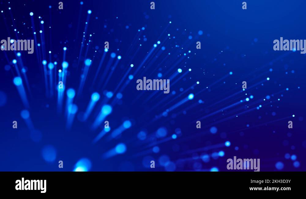 blue shiny sparkling particles with light rays move in a viscous liquid ...