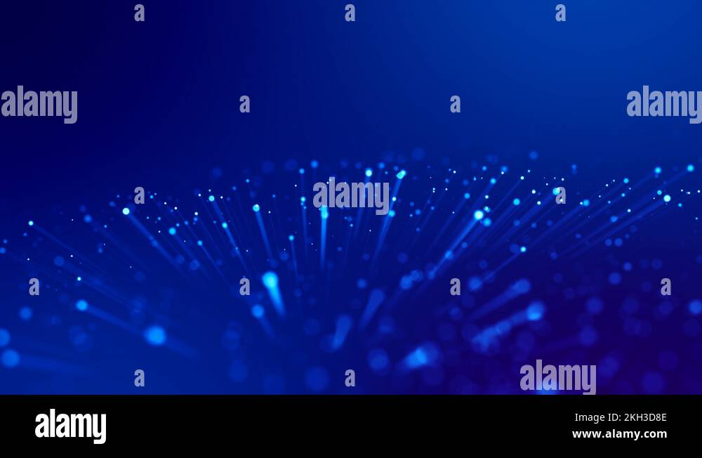 blue shiny sparkling particles with light rays move in a viscous liquid ...