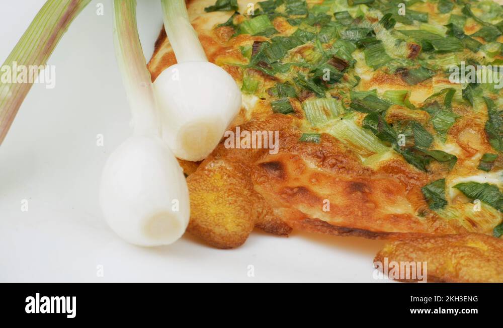 Onion pizza on white dish. National cuisine of Udmurts: The Tabani ...