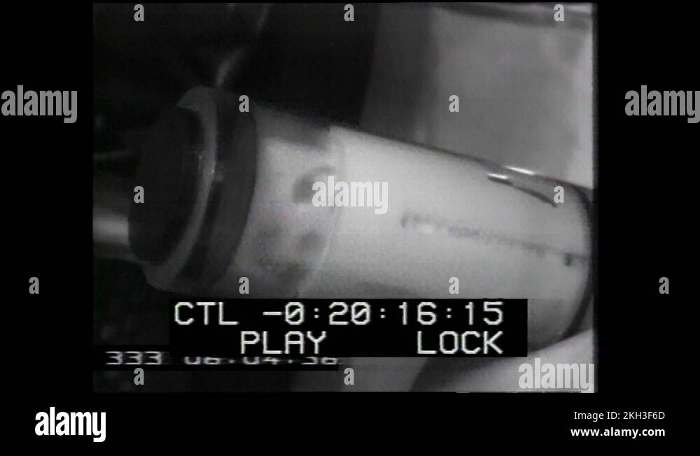 1990s: Footage of a mixture being mixed in a vial. Astronauts conduct ...