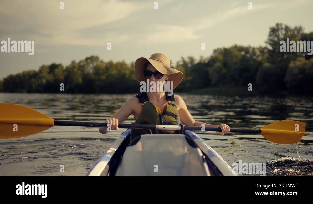 Close Up Girl In Kayak In Calm Water.Female With Canoe And Paddle Stock ...
