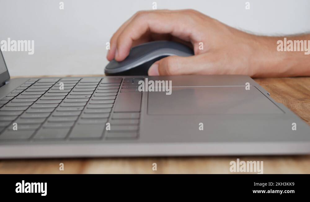 Hand using wireless mouse with laptop and types on the keyboard, personal Stock Video Footage ...