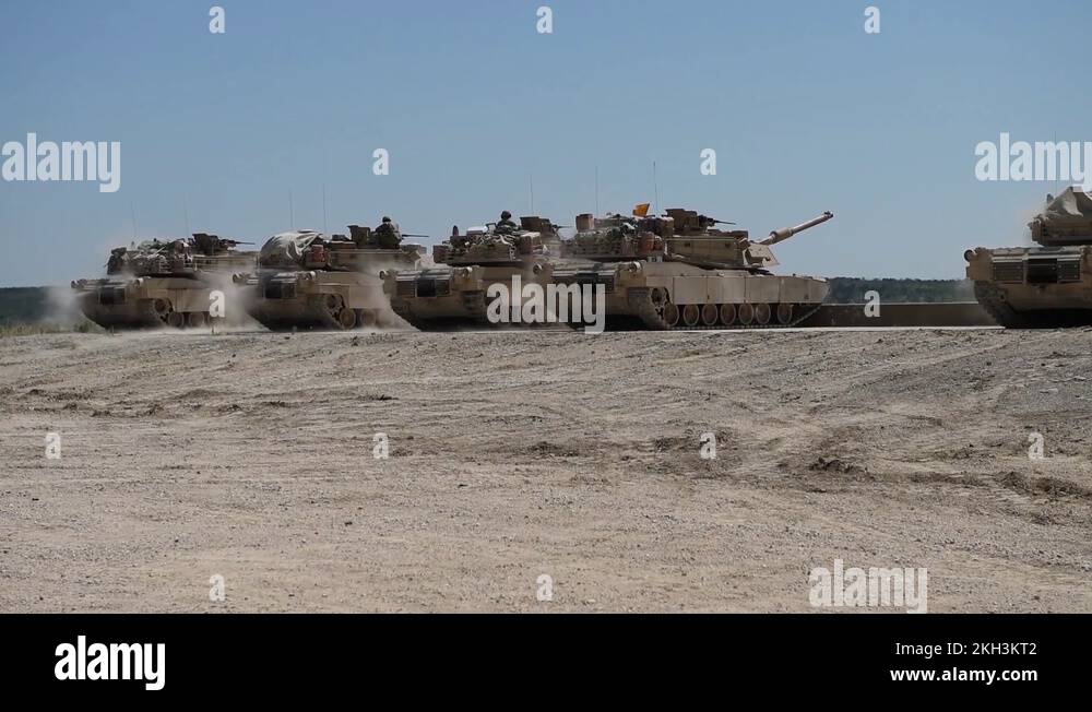 Row of tanks firing cannons at shooting range Stock Video Footage - Alamy