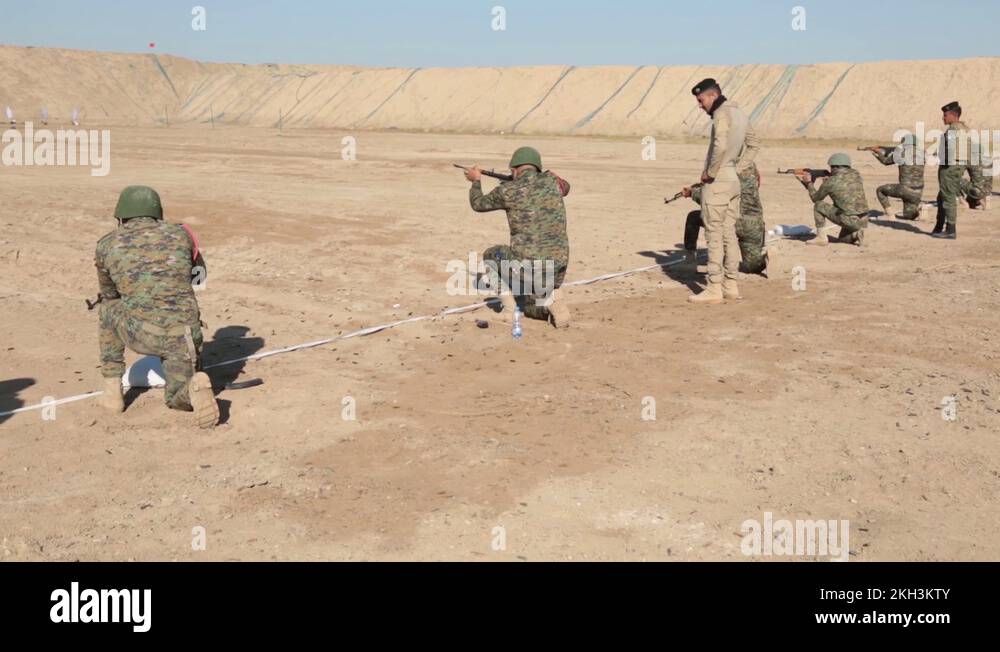 Iraqi soldiers firing AK-47 assault rifles at shooting range Stock ...