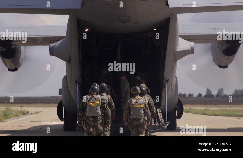 Romanian Air Force paratroopers boarding C-130 Hercules Stock Video ...