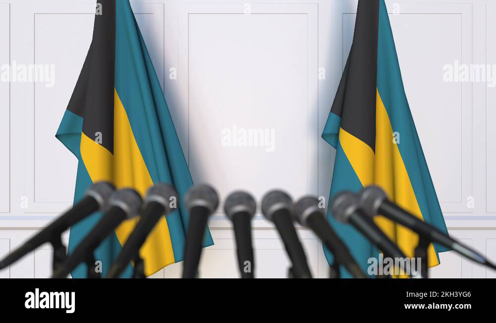 Bahamian official press conference. Flags of the Bahamas and ...
