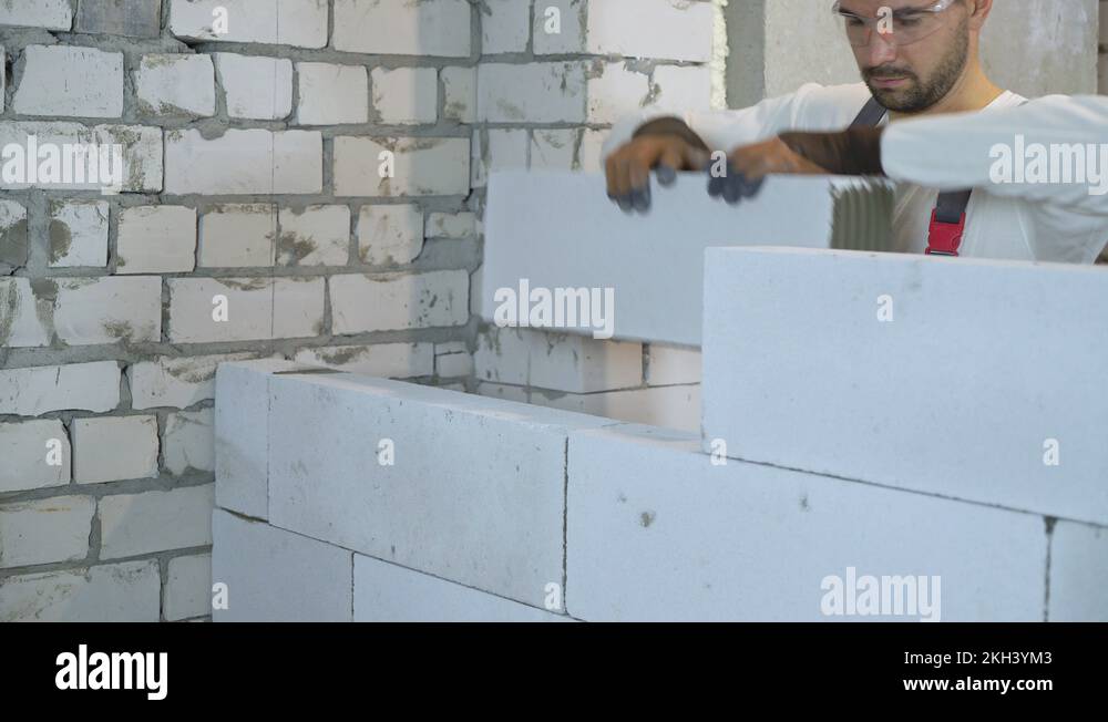Laying block Stock Videos & Footage - HD and 4K Video Clips - Alamy