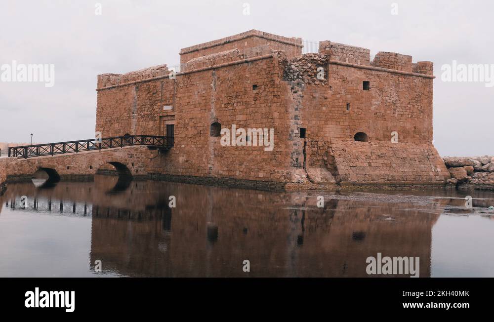 Beautiful brick castle in Paphos city. Side view of castle near sea ...