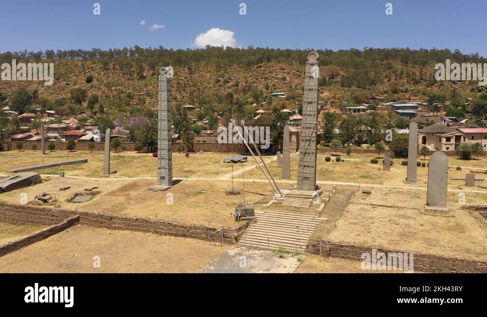 Drone shot flying around famous obelisk towers in Aksum, tourism ...