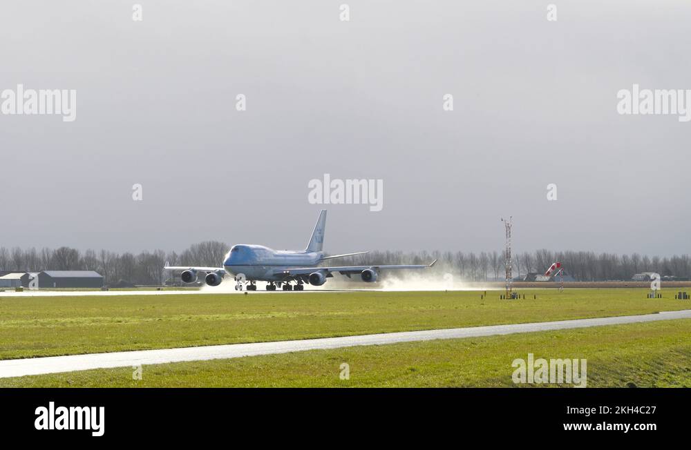 Big Jumbo Jet taking off from wet runway Stock Video Footage - Alamy