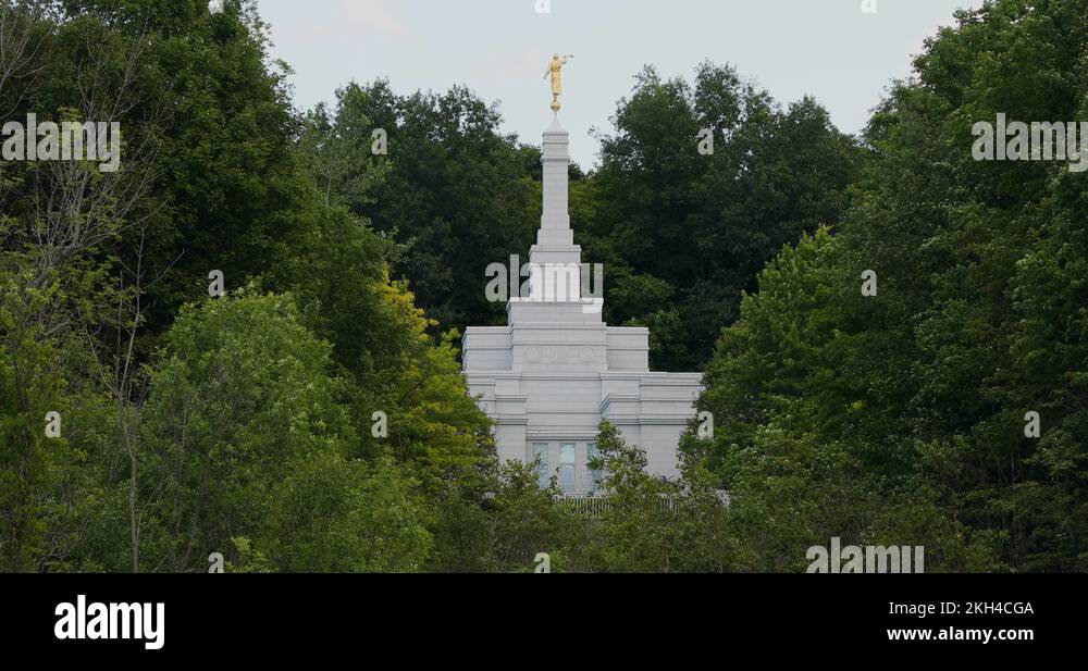 Palmyra New York LDS Mormon Temple spire through forest 4K Stock Video ...