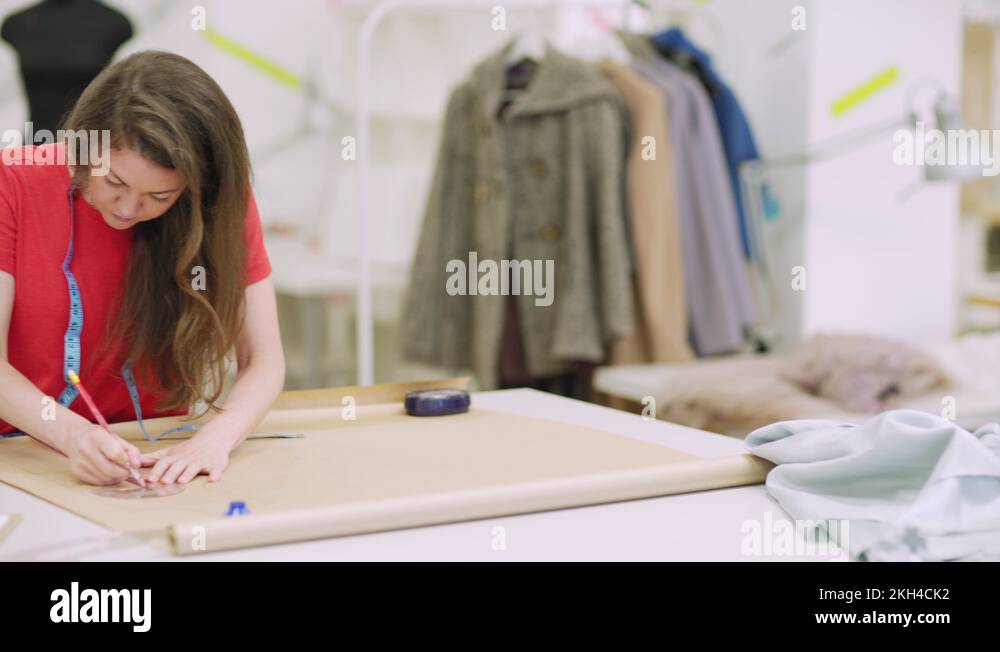 Tailor drawing sewing pattern Stock Video Footage - Alamy