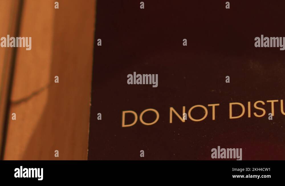 'Do Not Disturb' Sign Hanging From Outside Hotel Room, 4K Stock Video ...