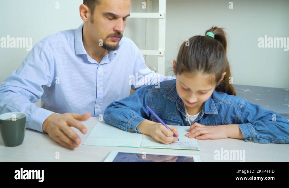 strict father is angry with his daughter doing homework Stock Video ...