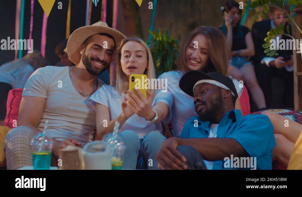 Modern Youth Friendly Girls And Guys Taking Group Selfies Posing