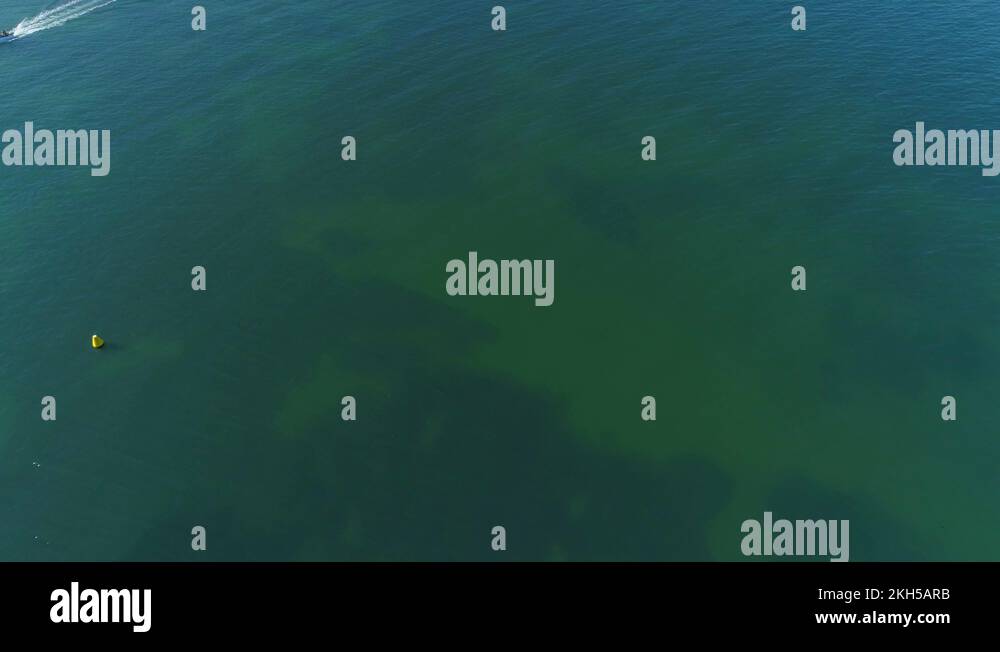 Forward flight with camera tilt upwards revealing beautiful Port ...