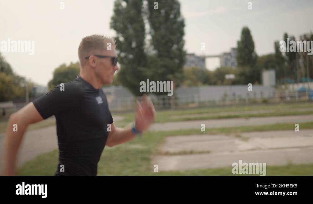 Marathon Runner Hard Training To Triathlon.Triathlete Running And ...