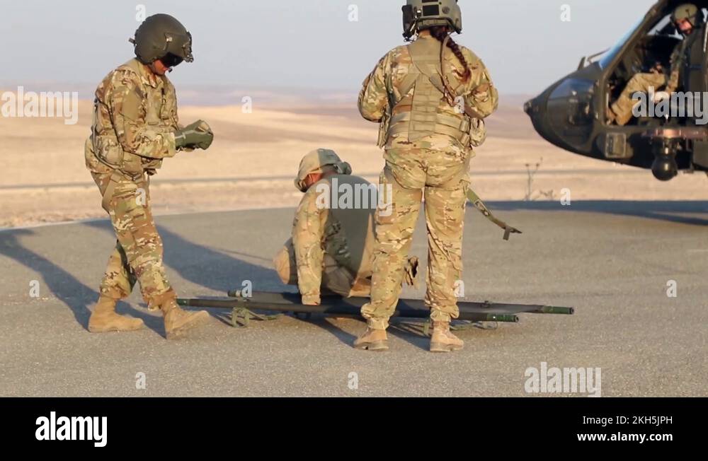 Soldier lying down on stretcher during Medical evacuation training ...