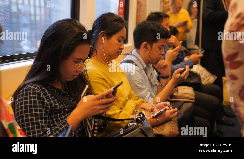 People using phones train Stock Videos & Footage - HD and 4K Video ...