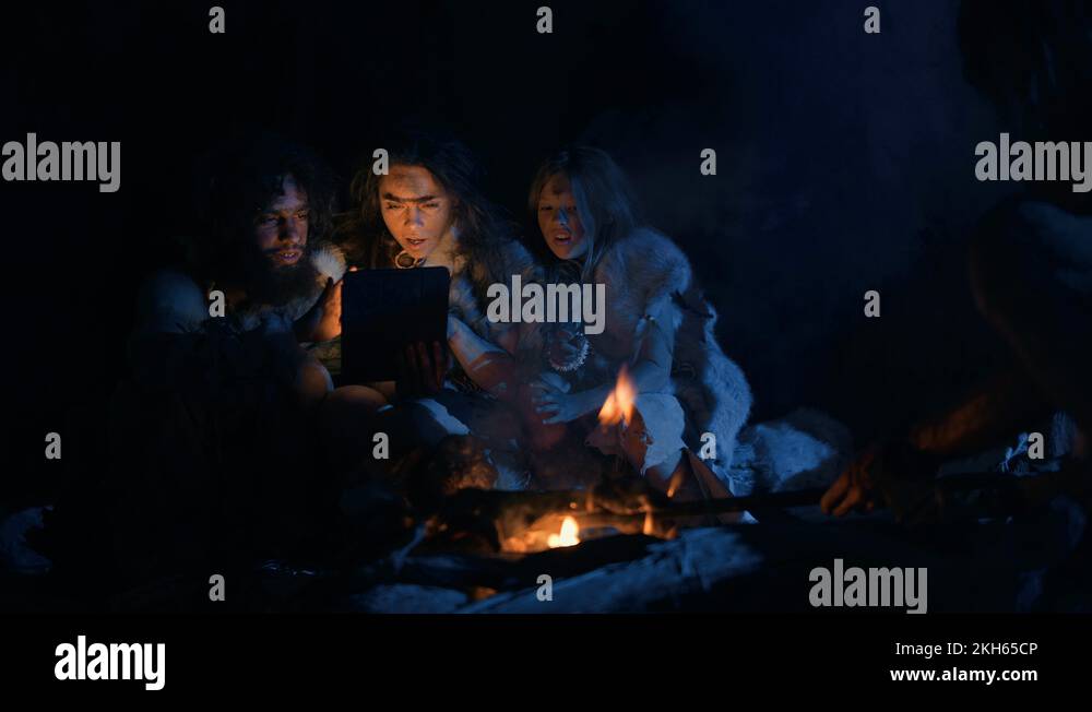 Tribe of Prehistoric Primitive Hunter-Gatherers Wearing Skins Use ...