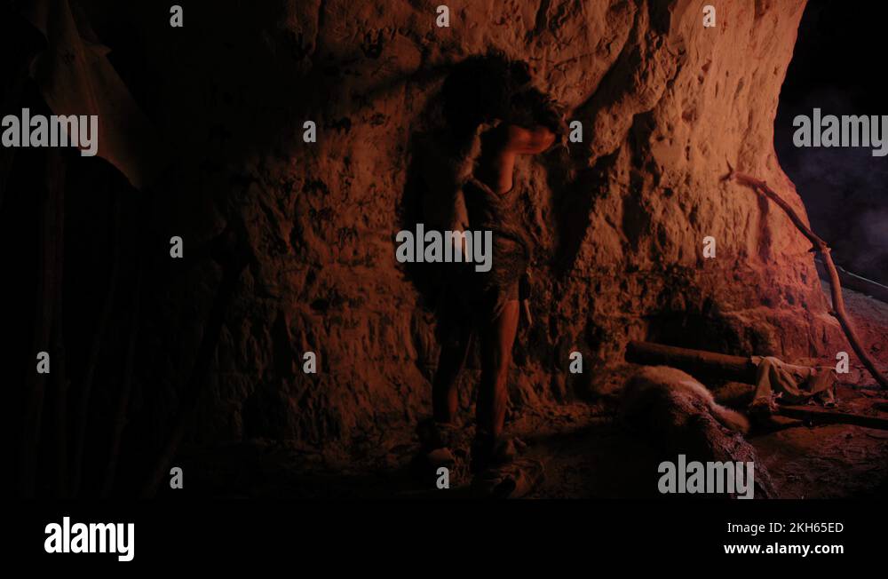 Primitive Prehistoric Neanderthal Wearing Animal Skin Draws Animals on ...